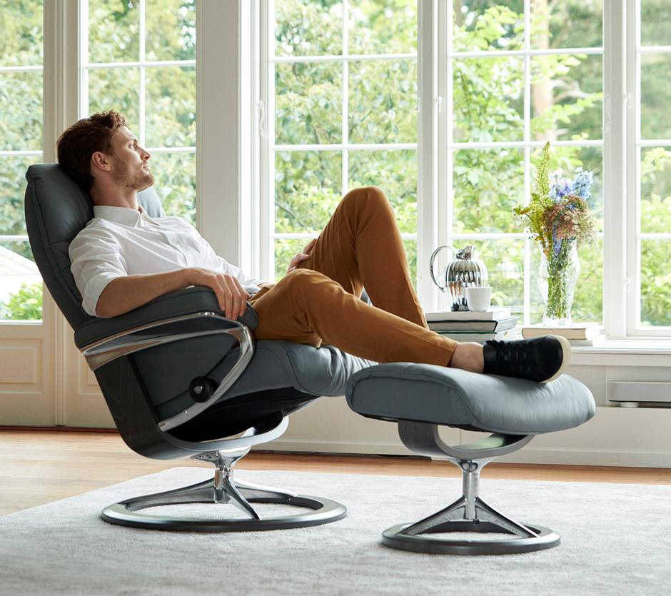 Man relaxing in Stressless Sunrise recliner